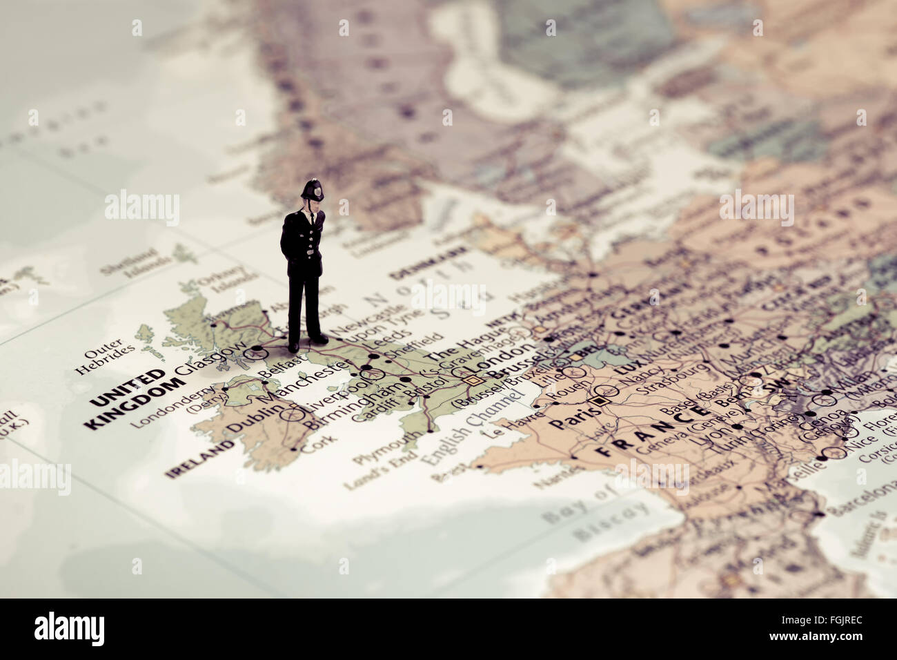 British police officer on top of UK map. Color tone tuned Stock Photo ...