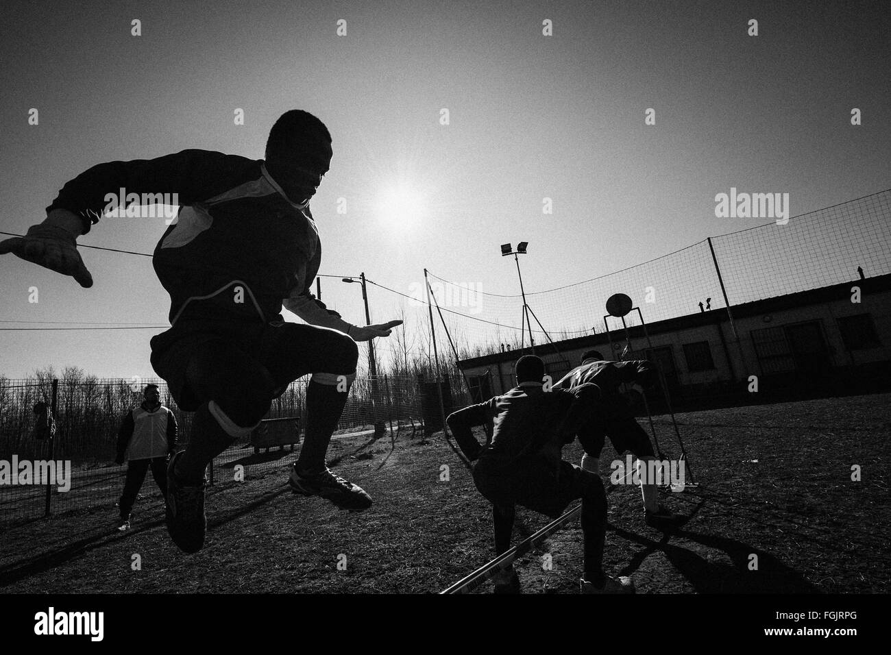 Italy, Parona, refugee center, football team Stock Photo - Alamy