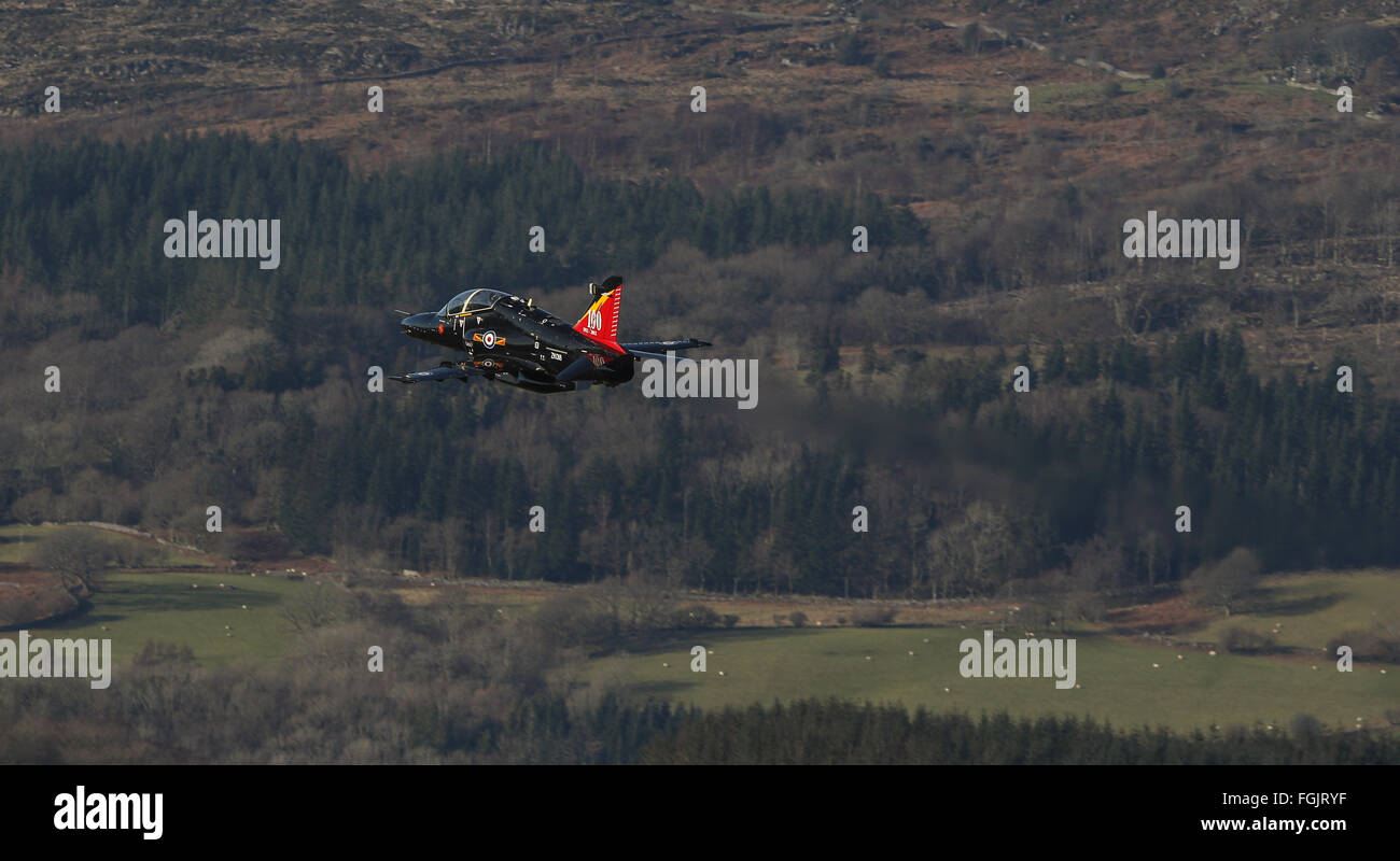 An RAF HAWK T2 training jet exiting the Mach Loop at high speed and low ...