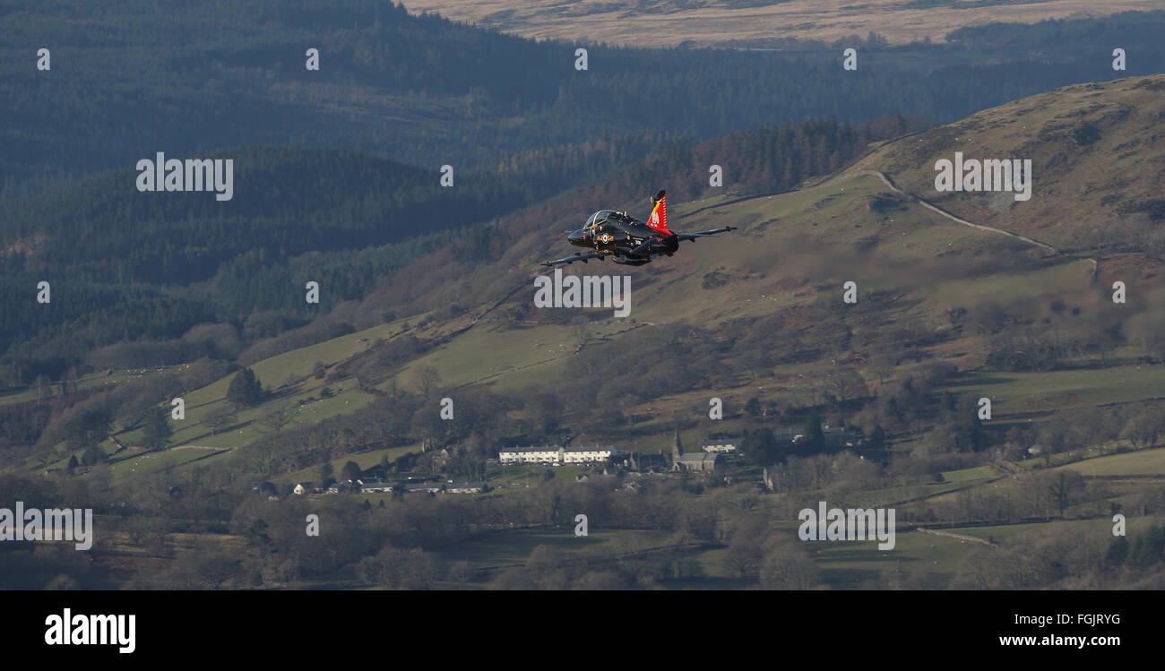 An RAF HAWK T2 training jet exiting the Mach Loop at high speed and low ...