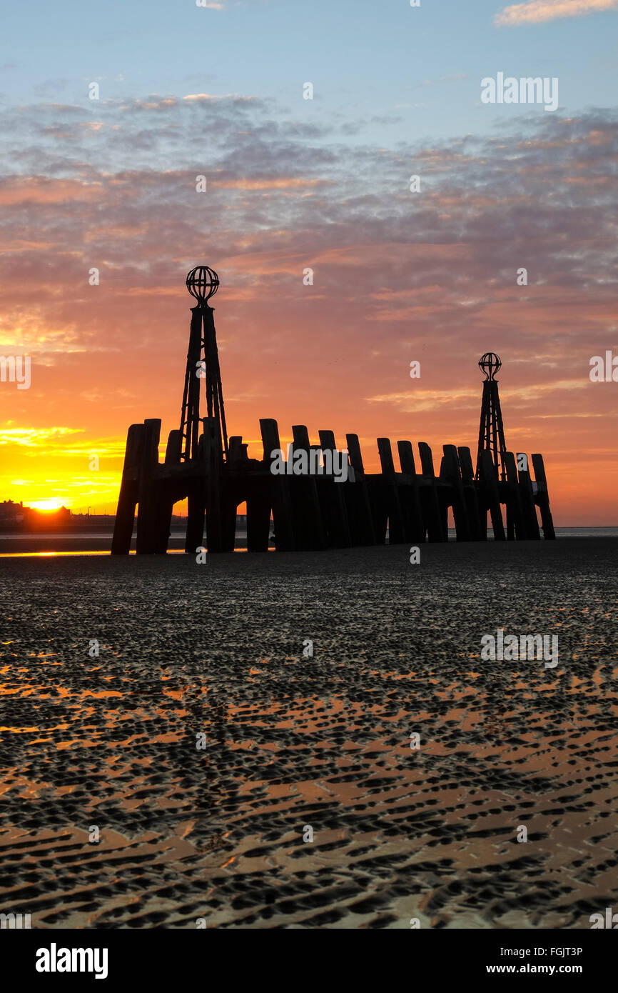 Lytham St Annes beach and the old ruined jetty at daybreak on the Fylde ...