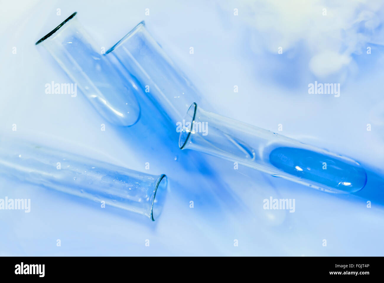 test tubes with the reactants chemical background Stock Photo - Alamy