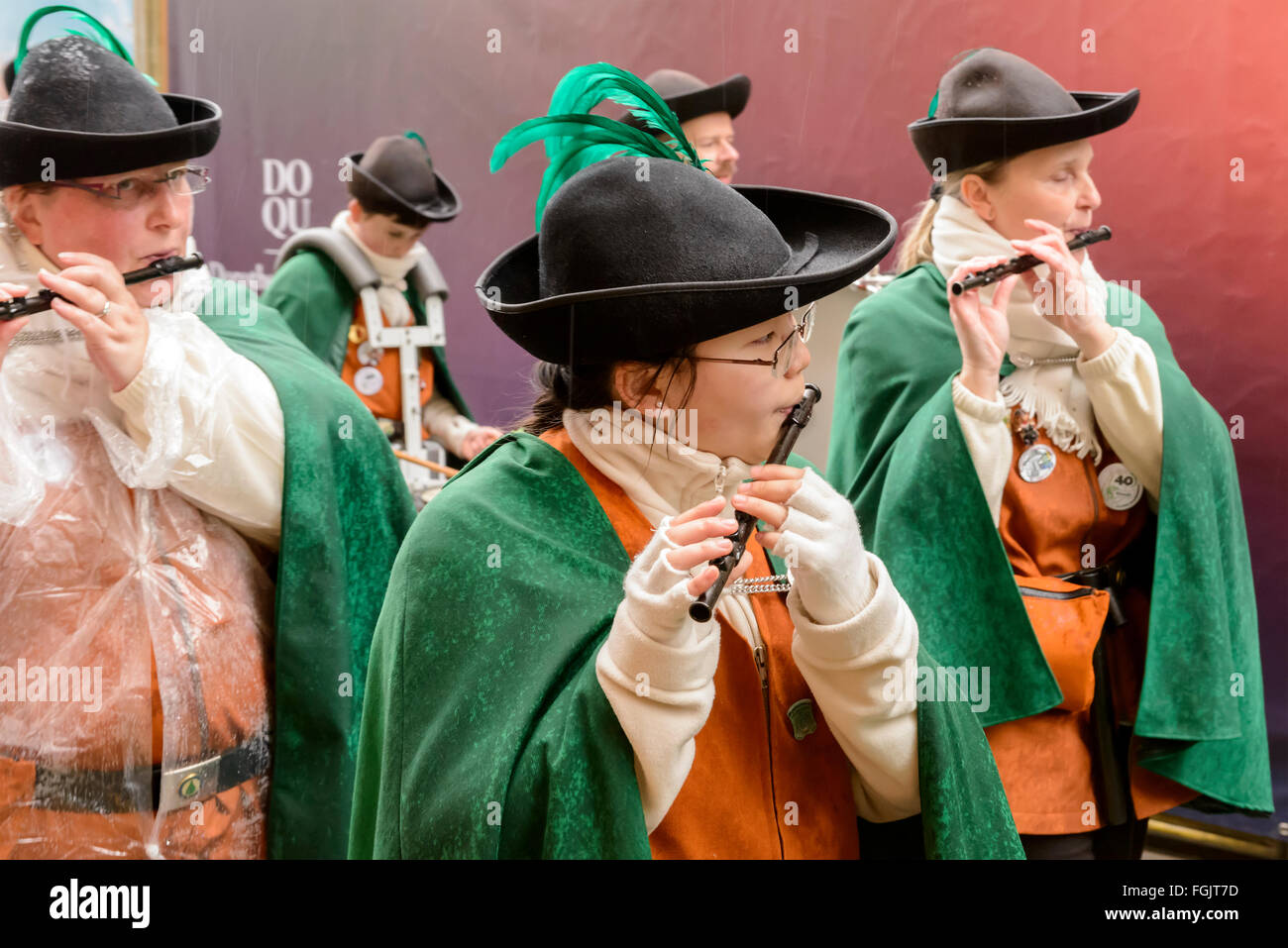flute player marching under rain at Carnival parade, Stuttgart Stock ...
