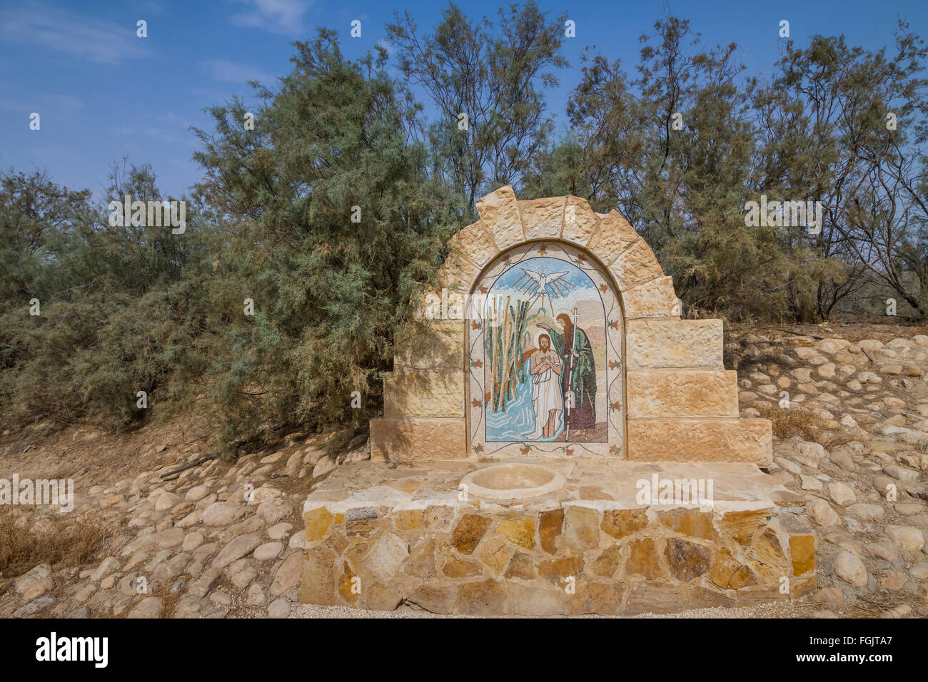 A mosaic monument of John the Baptist and Jesus at Bethany Beyond the ...