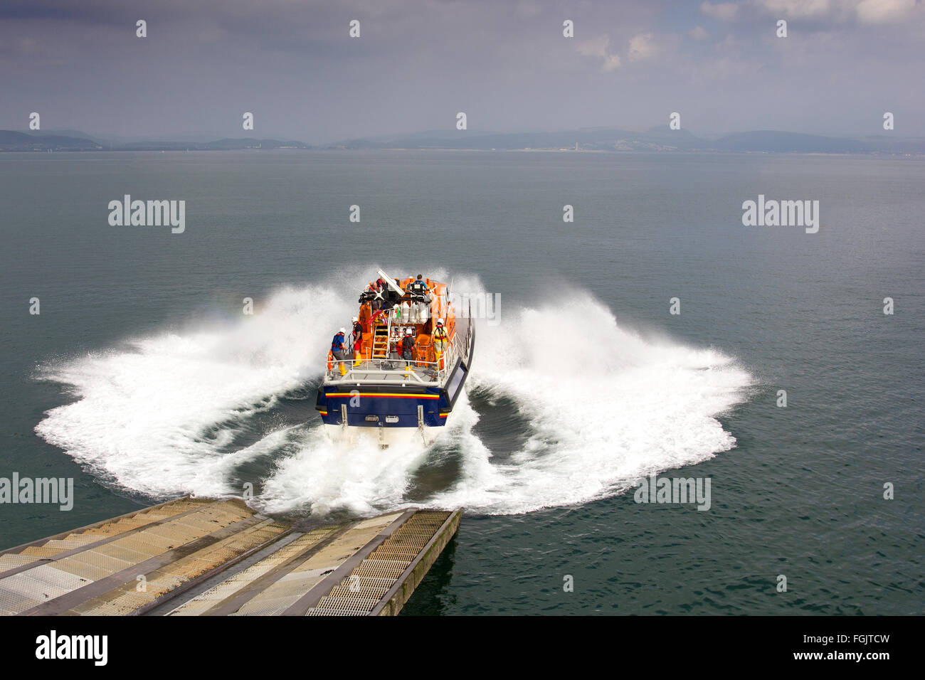 The new Mumbles Lifeboat launching from the slipway of the newly built ...