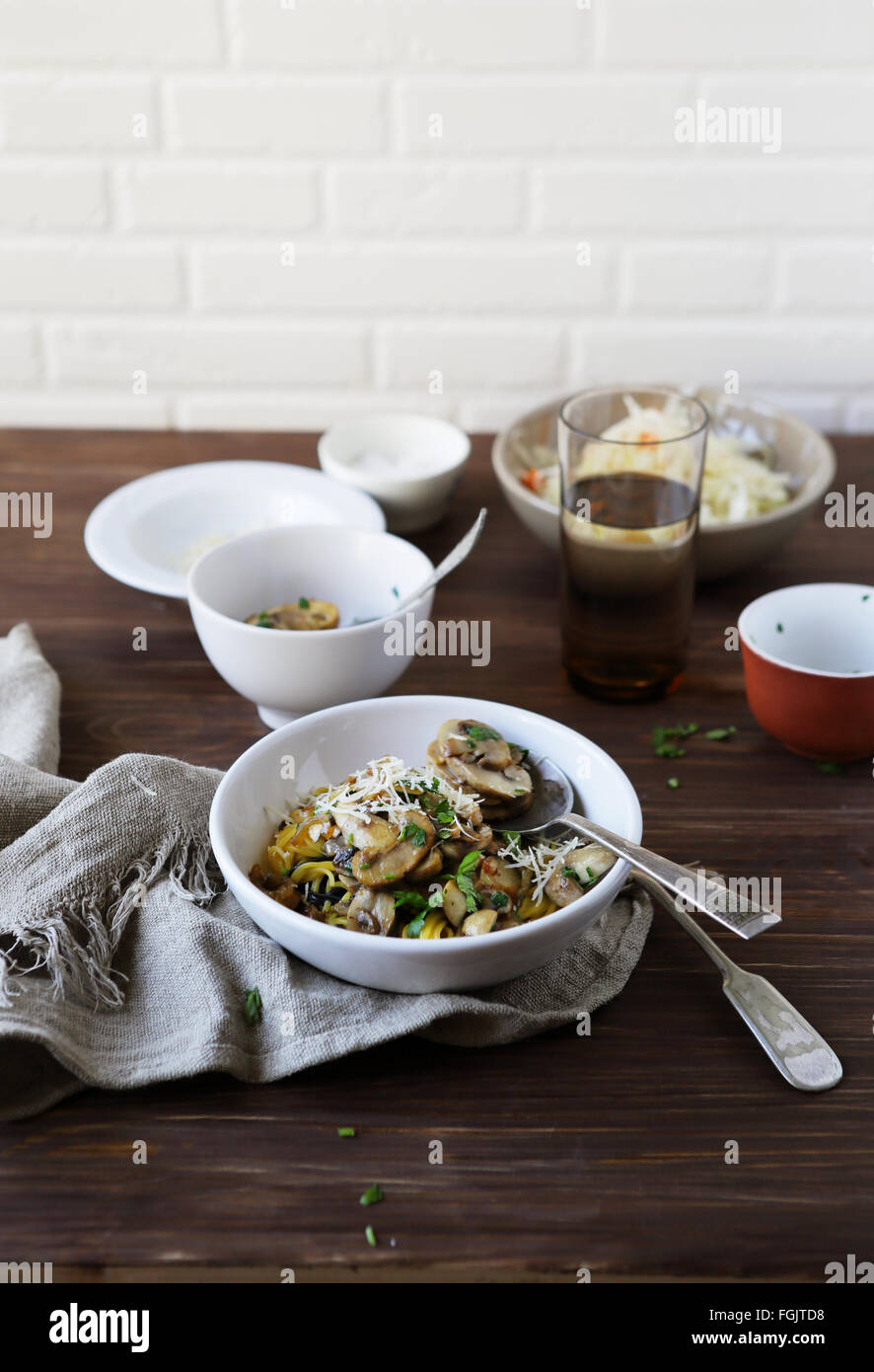 italian pasta in white bowl, table setting Stock Photo - Alamy