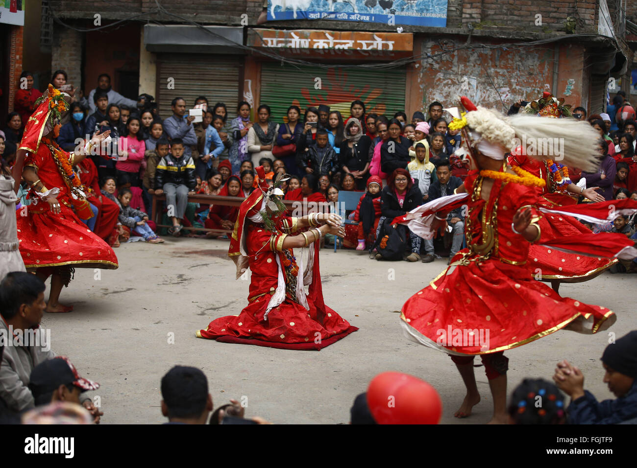 Kathmandu, Nepal. 20th Feb, 2016. People dressed as deities perform a ...