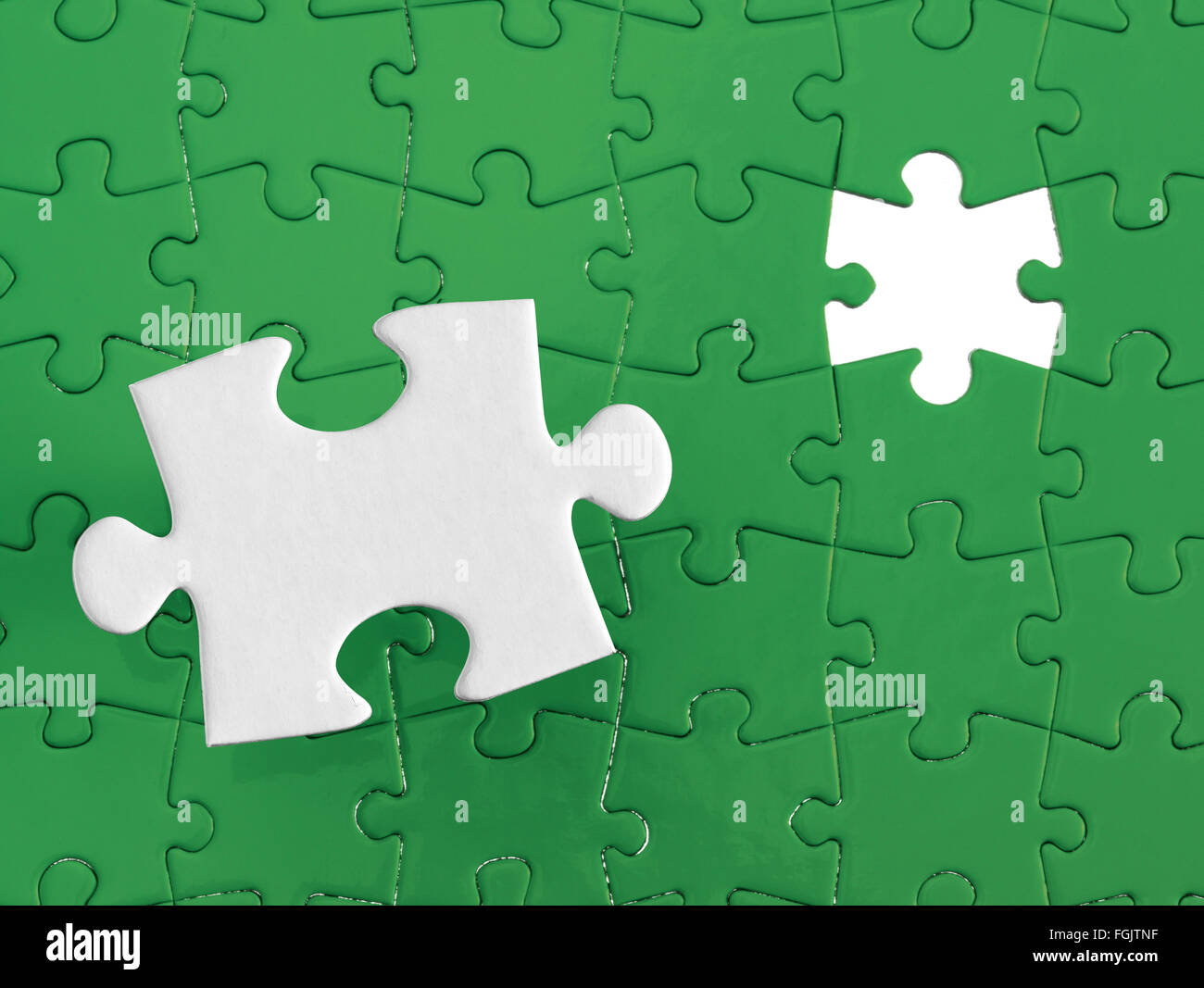 Green jigsaw hi-res stock photography and images - Alamy