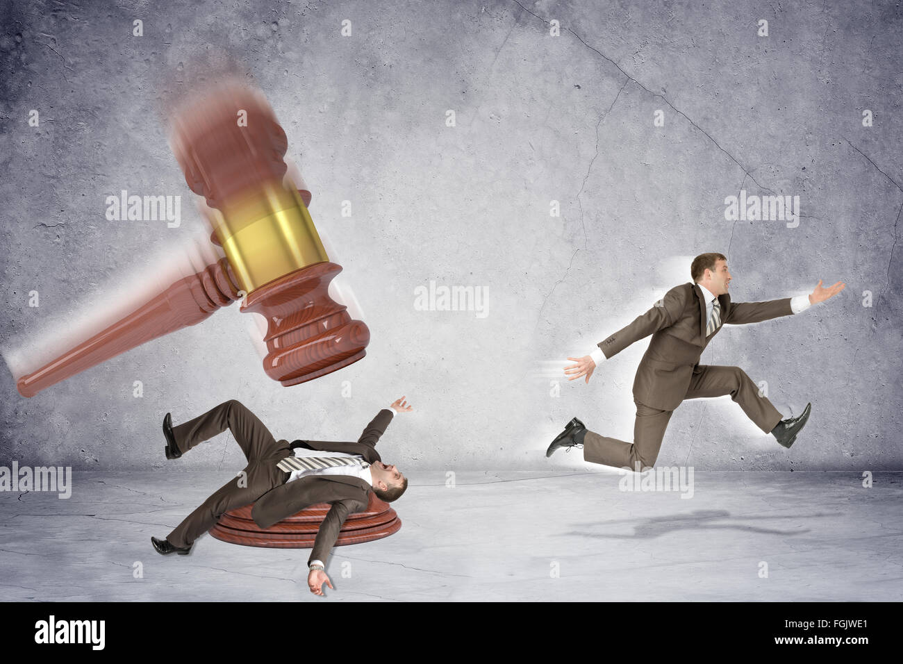 Inscribed gavel hitting businessman Stock Photo - Alamy