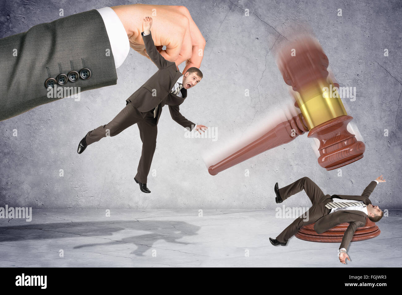 Inscribed gavel hitting businessman Stock Photo - Alamy