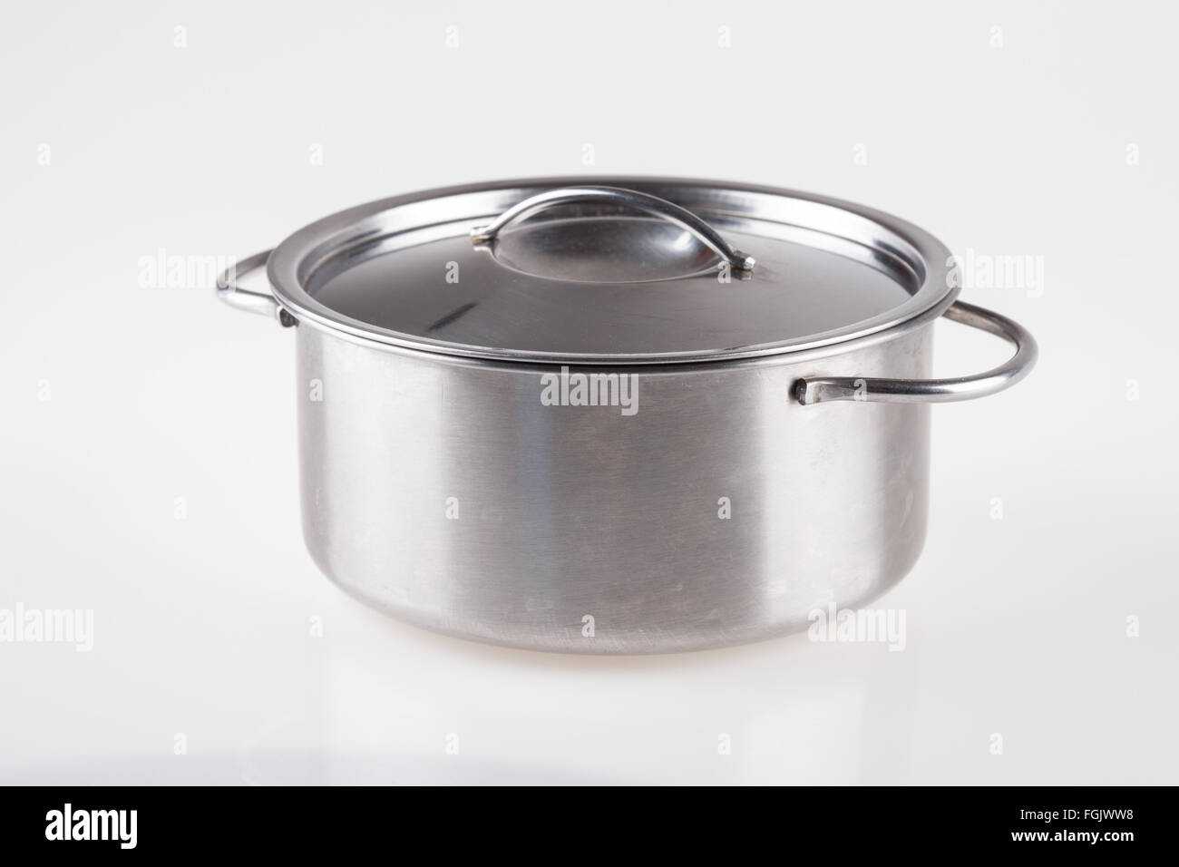 metal pot on a white background Stock Photo - Alamy