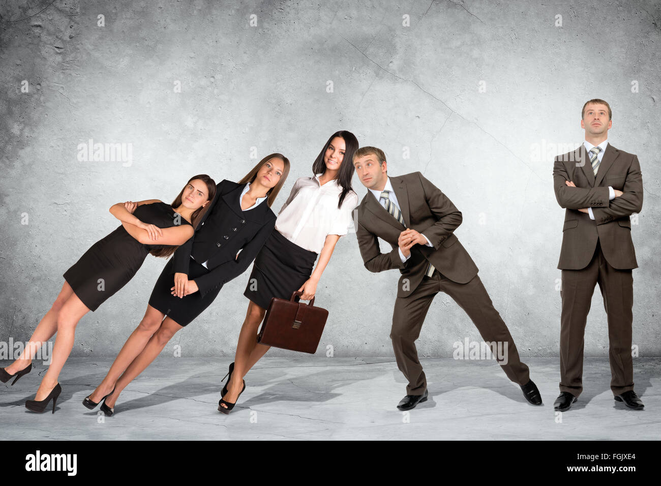 Businessman supporting business people Stock Photo - Alamy
