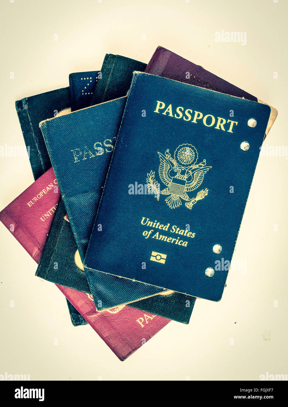 a pile of old passports Stock Photo - Alamy