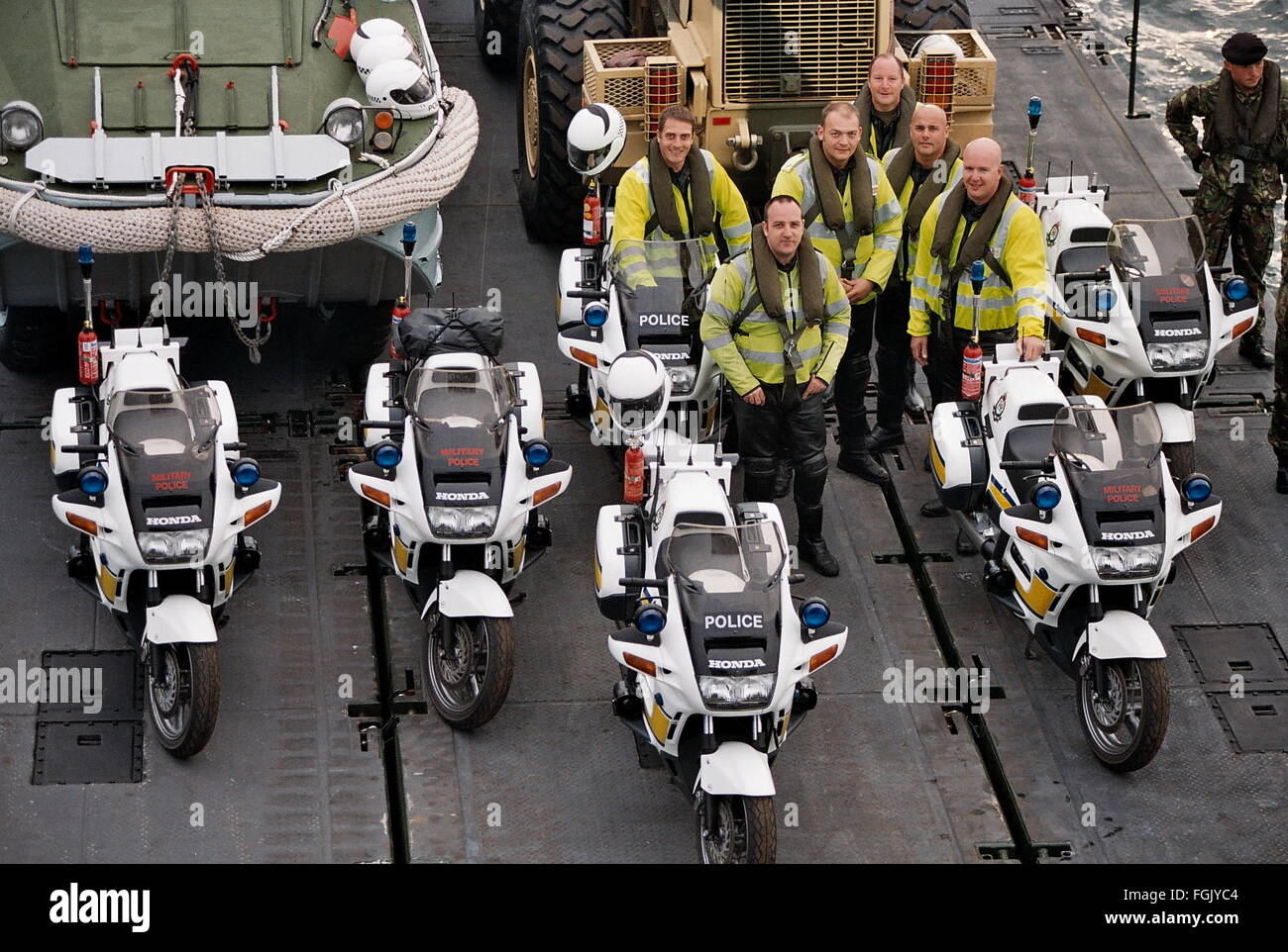 AJAXNETPHOTO. 2004. OUISTREHAM, FRANCE. - BIKE RIDERS - A GROUP OF ...