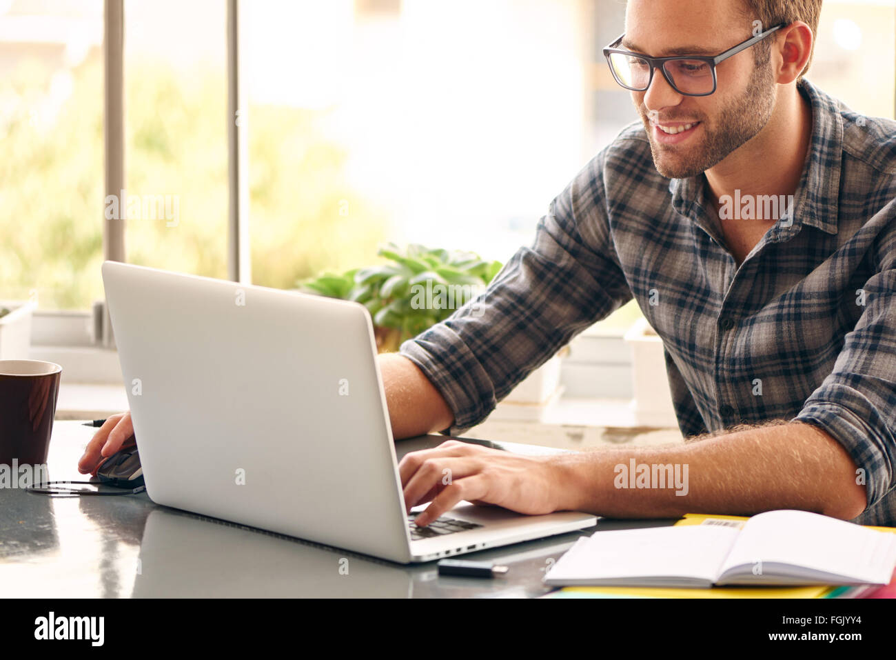 Man sitting computer desk hi-res stock photography and images - Alamy