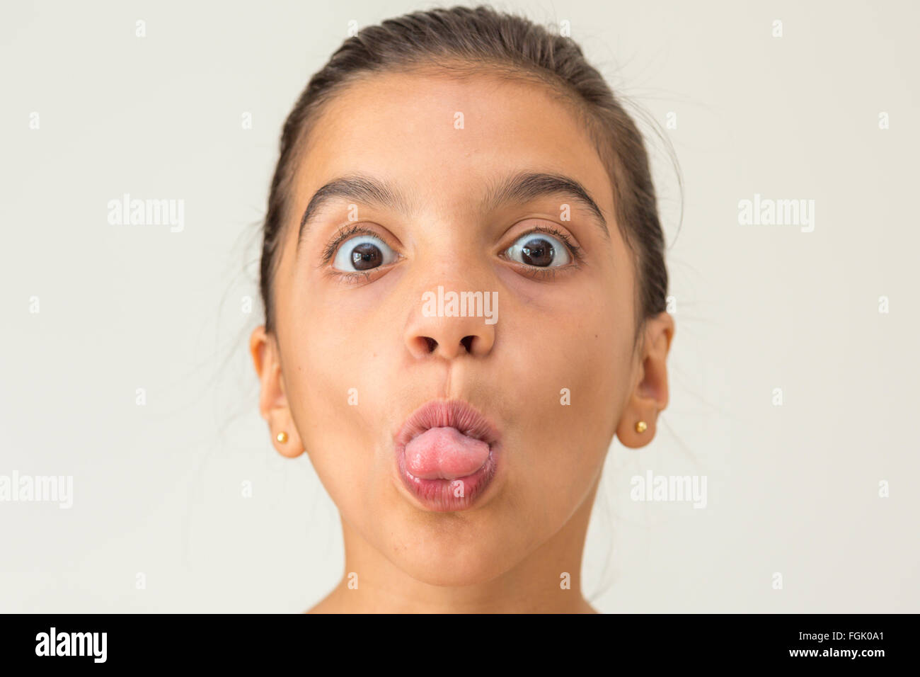 Young gril showing tongue hi-res stock photography and images - Alamy Young gril showing tongue hi-res stock photography and images - Alamy