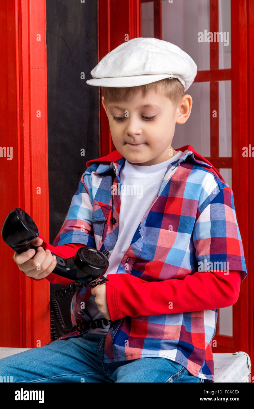 boy holding a telephone receiver Stock Photo - Alamy