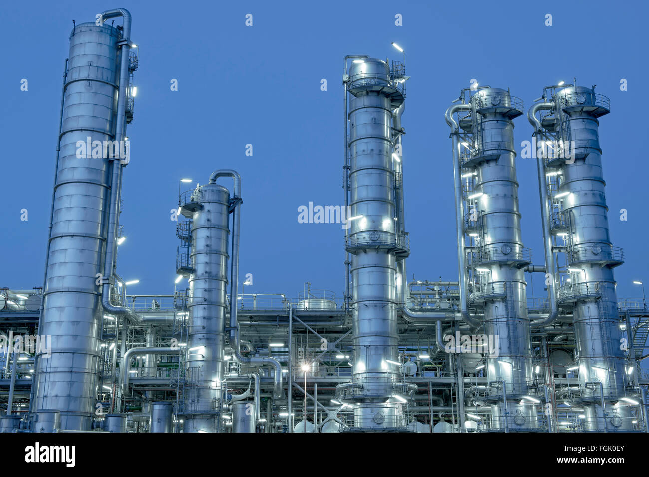 Oil refinery installation at night Stock Photo - Alamy