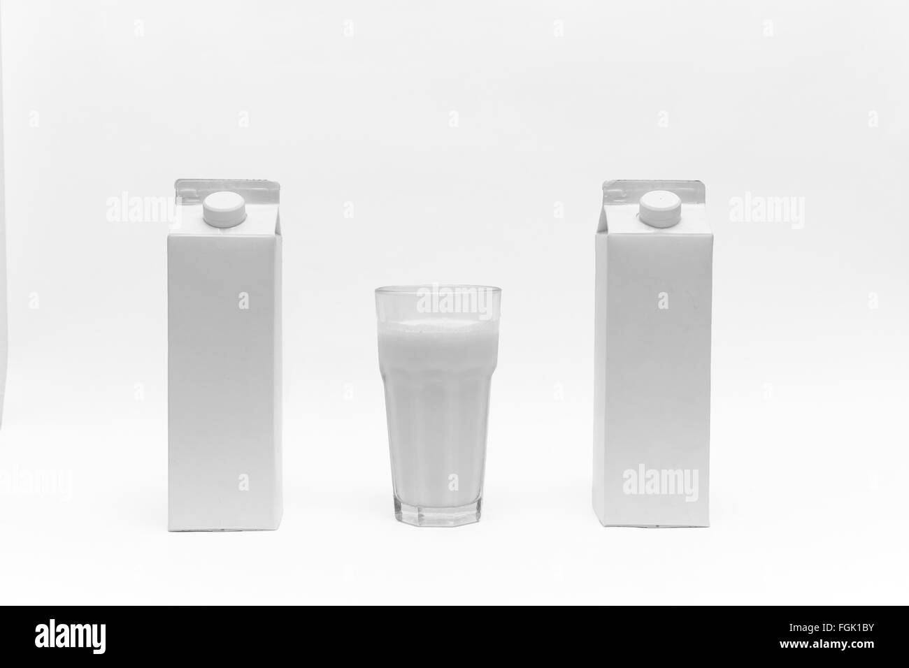 White blank milk box and a glass of milk, on white background Stock ...