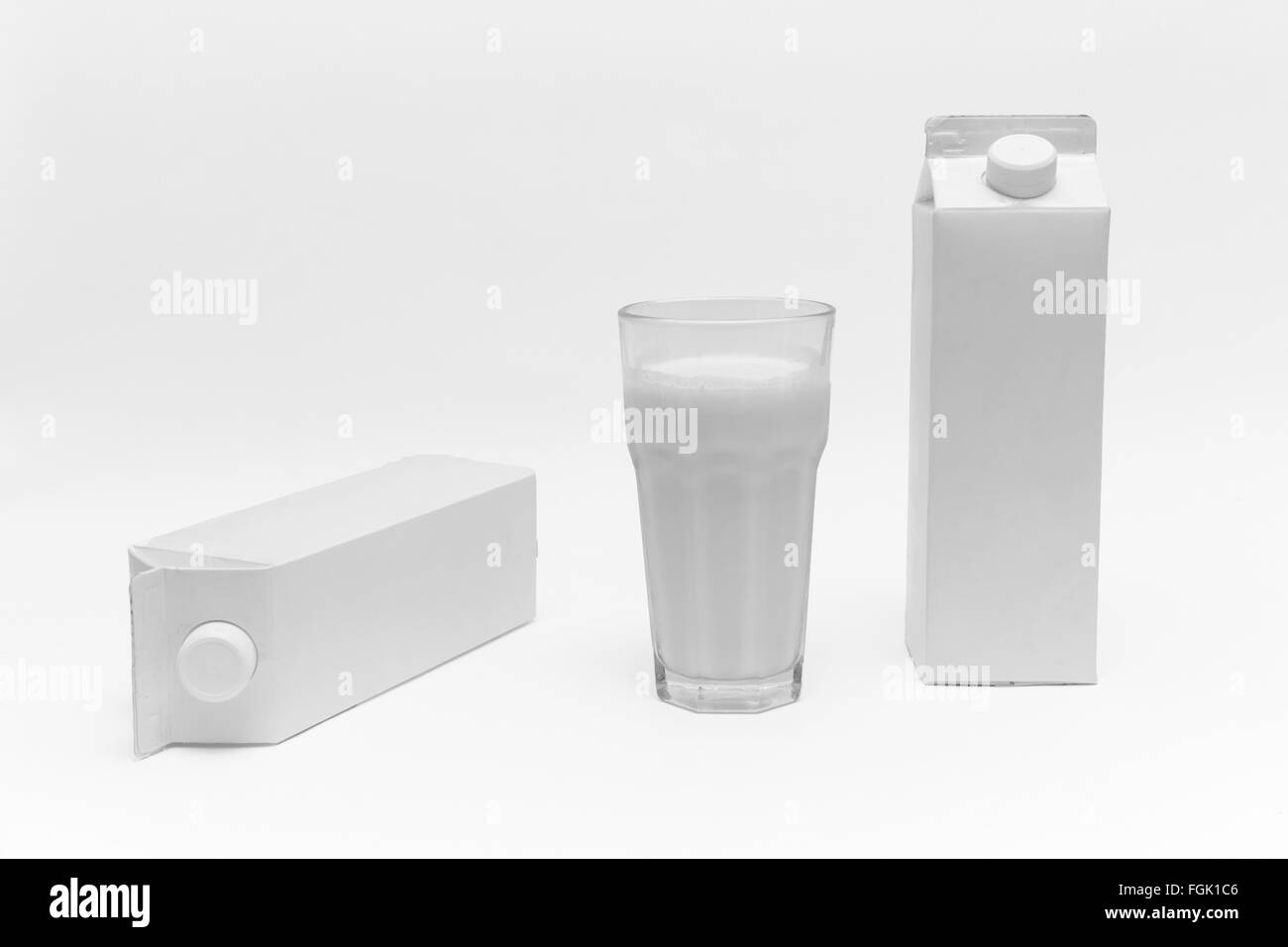 White blank milk box and a glass of milk, on white background Stock ...