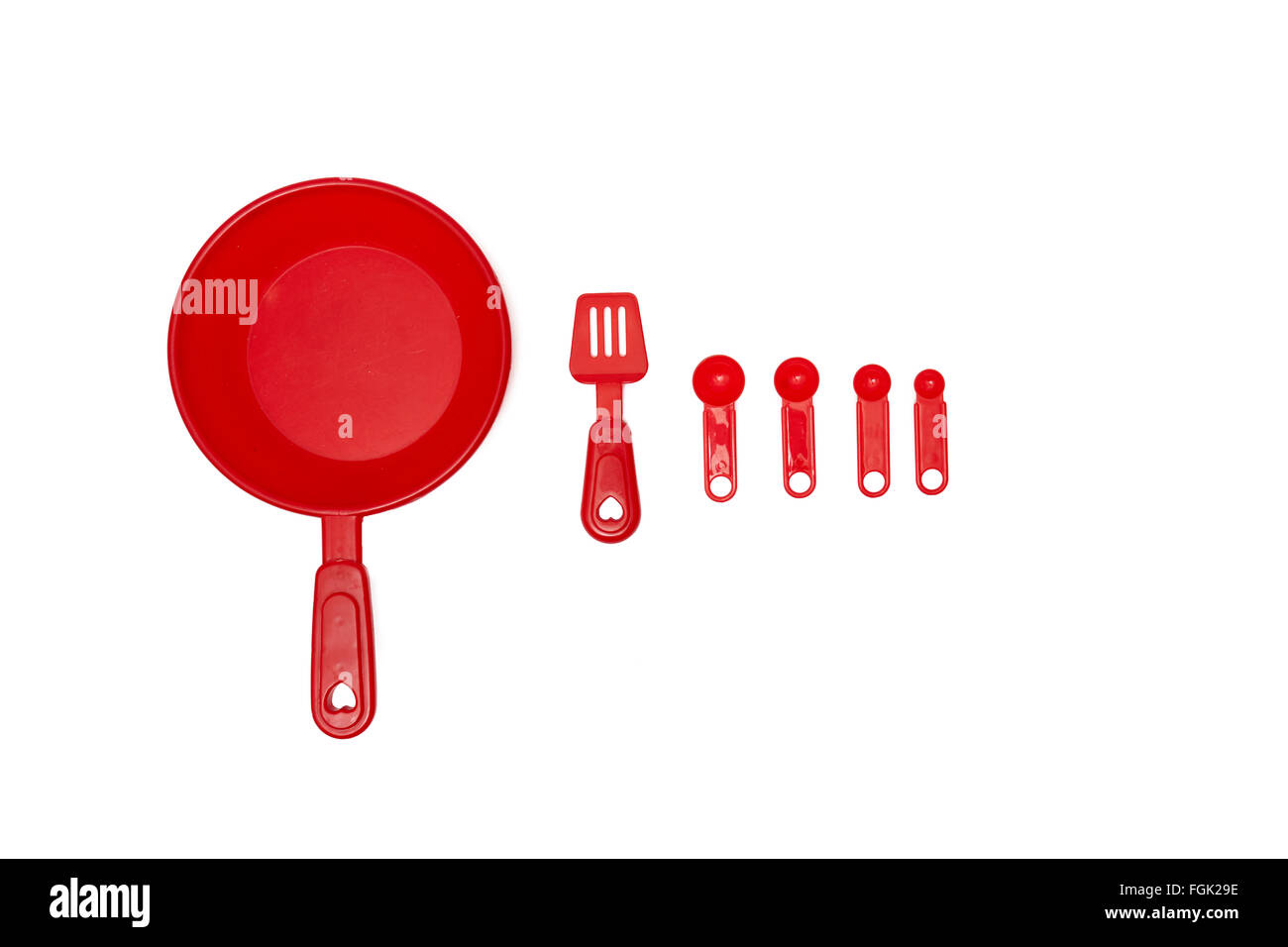 Children's plastic cooking toys, on white background Stock Photo - Alamy