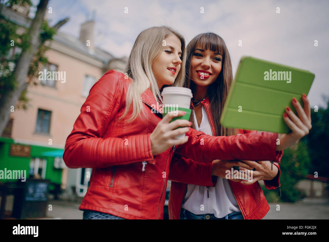 girls with phone Stock Photo - Alamy