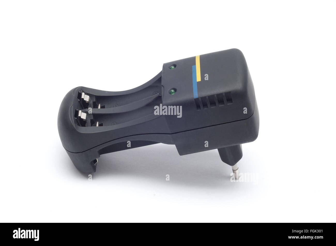 Black battery charger isolated on white background Stock Photo - Alamy