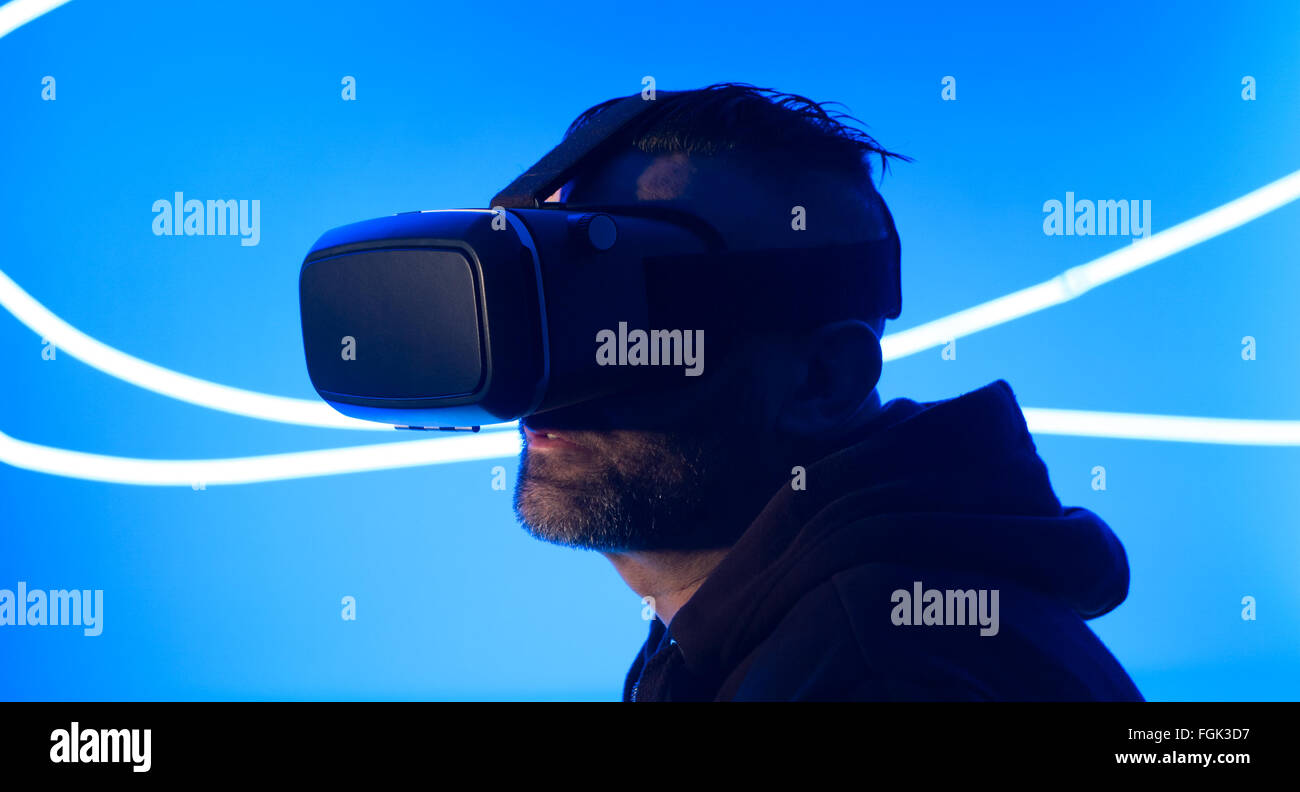 Interactive virtual reality blue background Stock Photo - Alamy