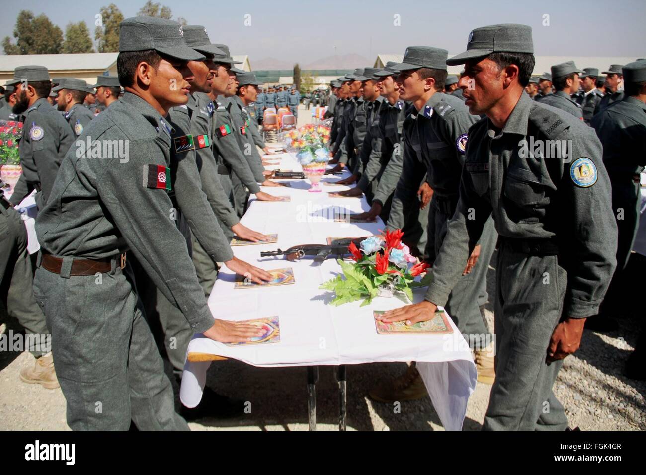 Nangarhar, Afghanistan. 20th Feb, 2016. Afghan policemen attend their ...