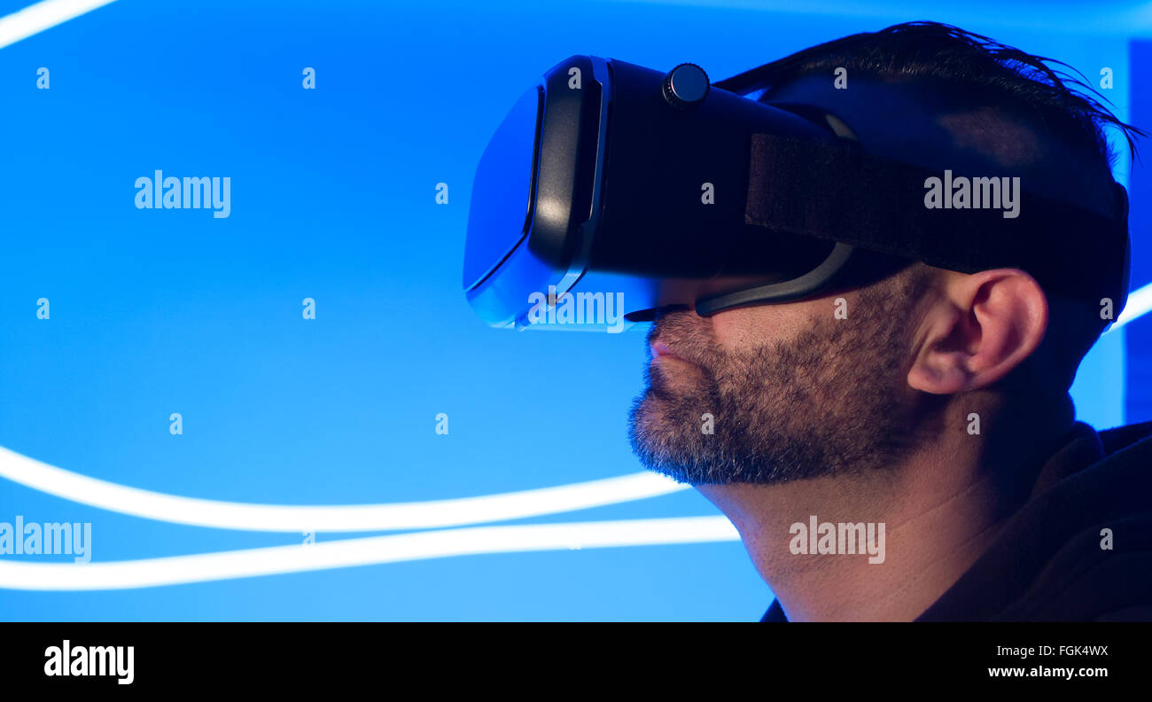 Virtual reality concept blue background Stock Photo - Alamy