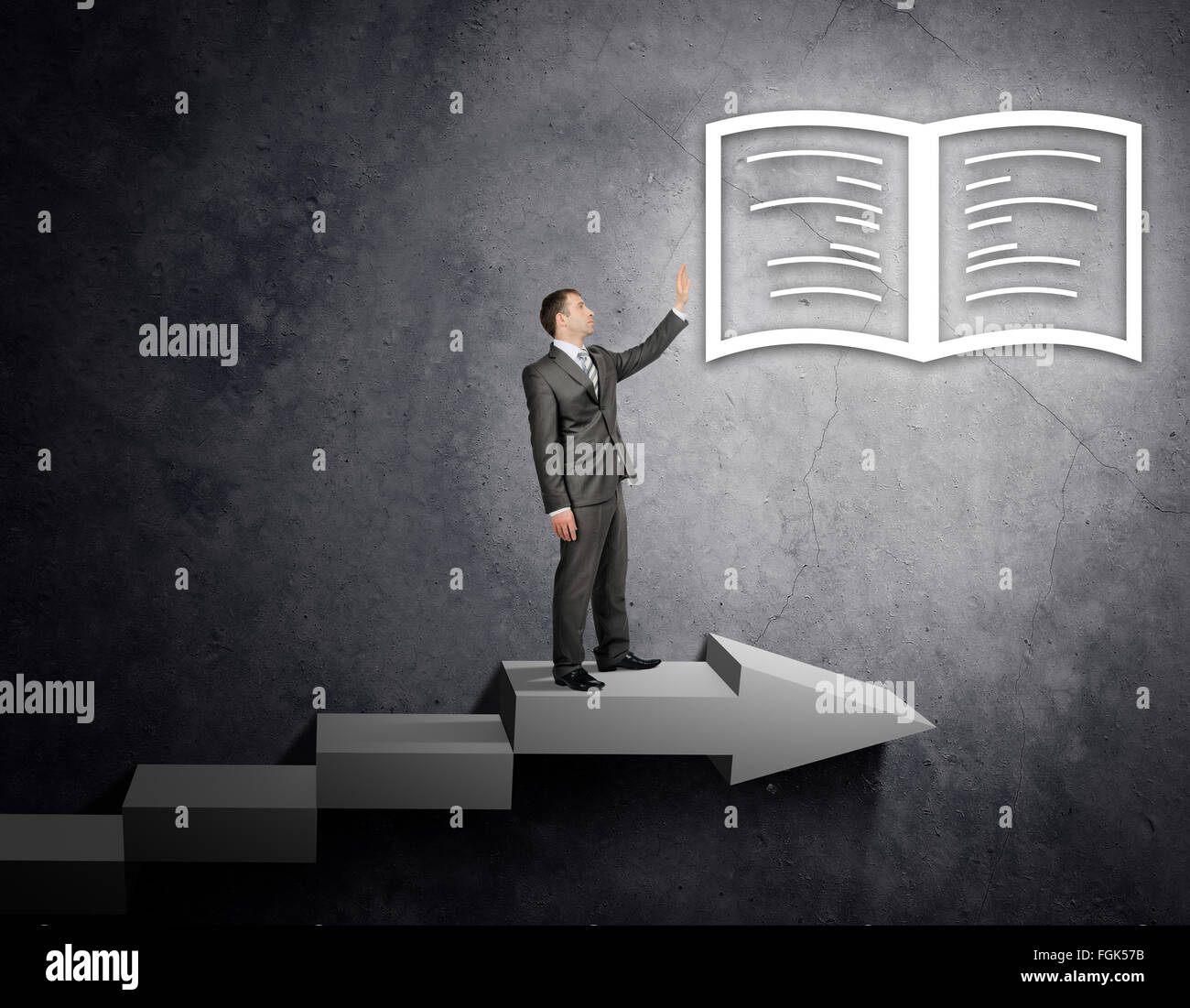 Businessman touching book sign Stock Photo - Alamy