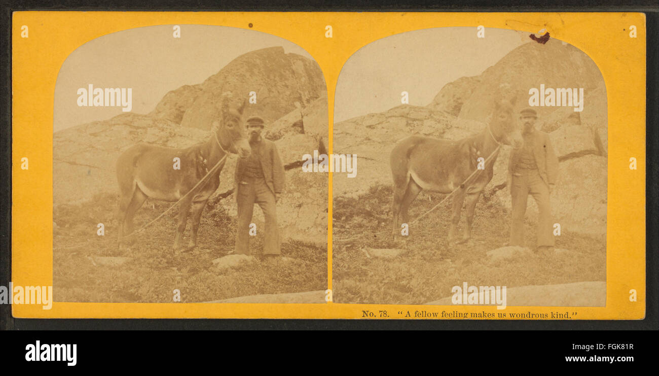 This historical photograph captures the phrase 'A fellow feeling makes ...