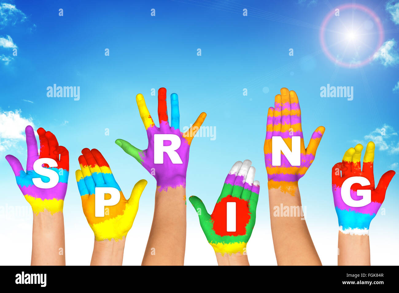 Set of colorful hands with word spring Stock Photo - Alamy