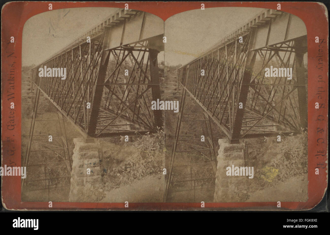 A photograph by George F. Gates showing the iron railroad bridge over ...