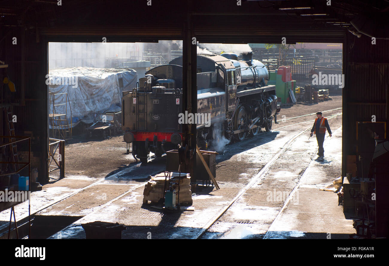 Steam engine moving out of engine shed after maintenance by the North ...