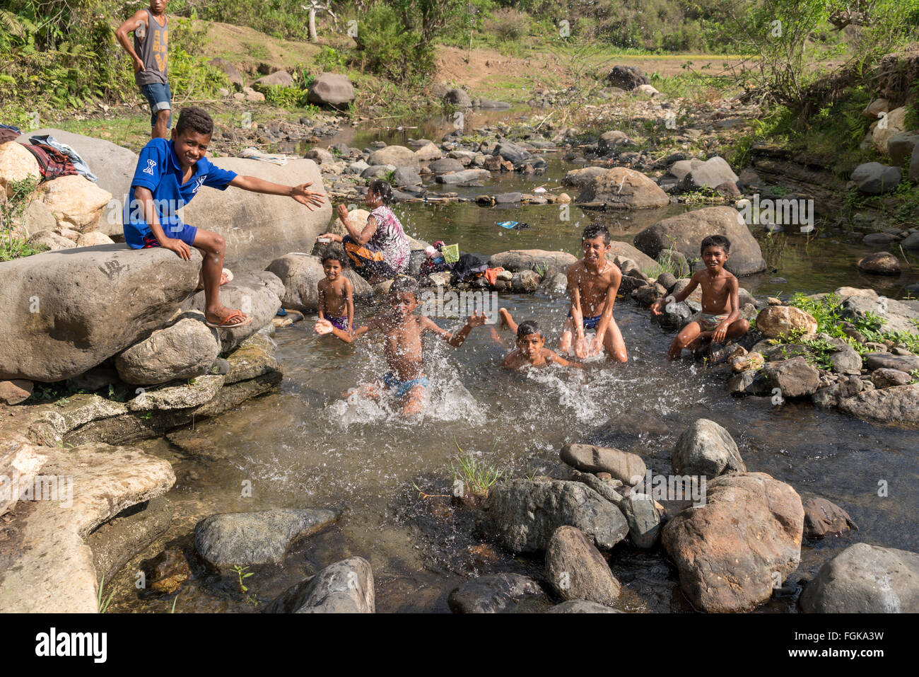 children playing in the river in Moni, Flores, Indonesia, Asia Stock ...
