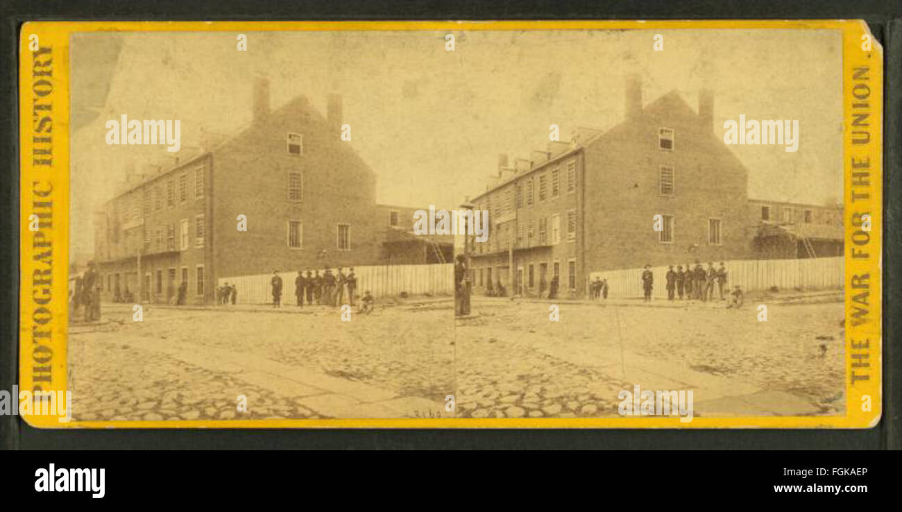 A photograph by Mathew B. Brady showing Castle Thunder on Carey Street ...