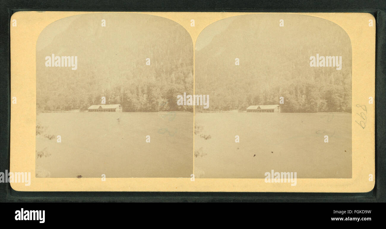 A photograph of Profile Lake and Eagle Cliff in Franconia Notch. The ...