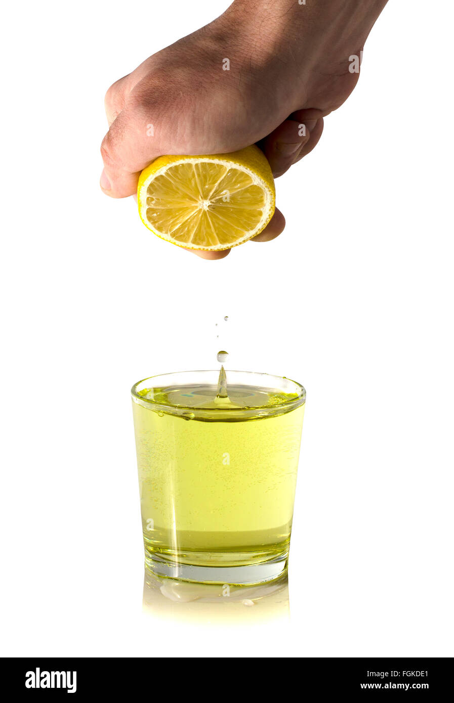Squeezing lemon to glass hi-res stock photography and images - Alamy