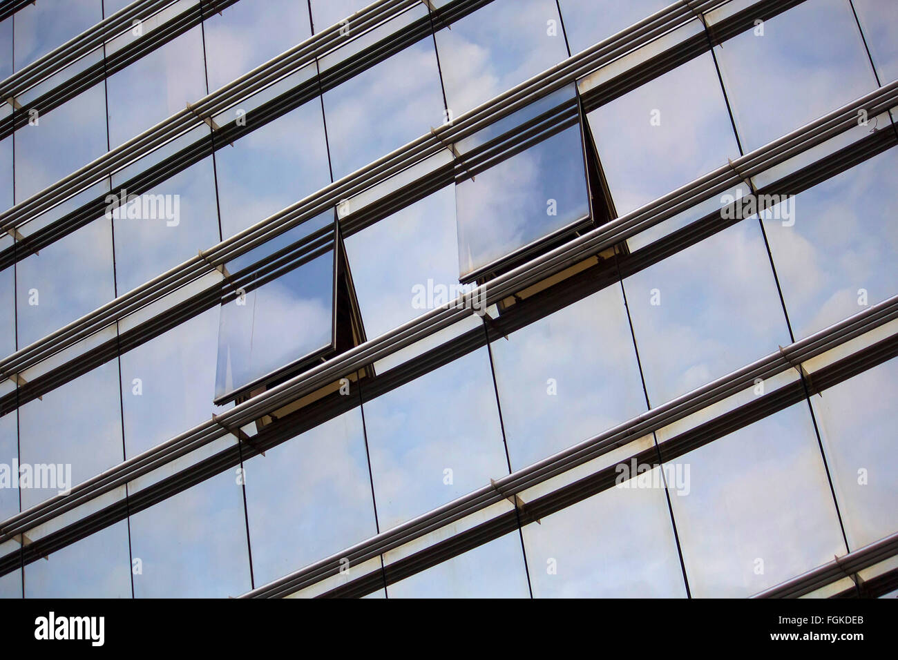 Sunset sky reflection in modern building Stock Photo - Alamy