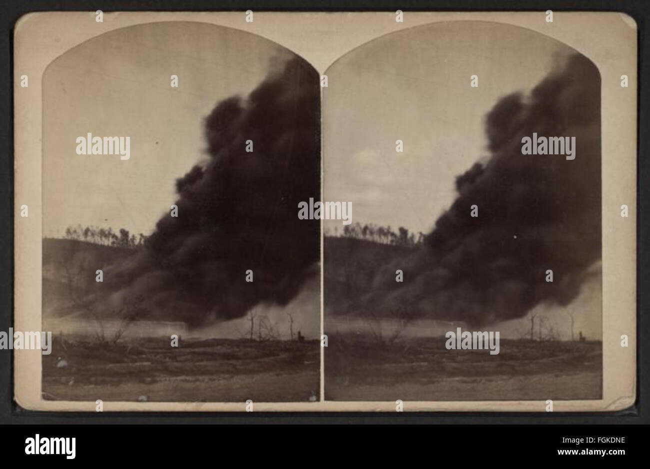 A photograph capturing the Rixford oil fire, taken by West & Waddell ...
