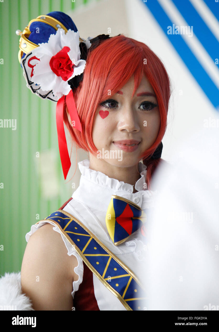 Pasay City, Philippines. 20th Feb, 2016. A cosplayer smiles for a ...