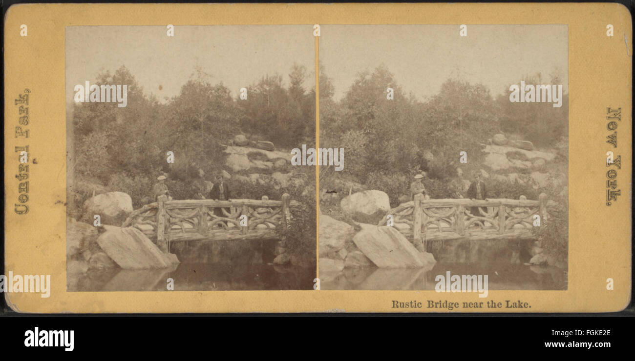A photograph by William M. Chase showing a rustic bridge near a lake ...