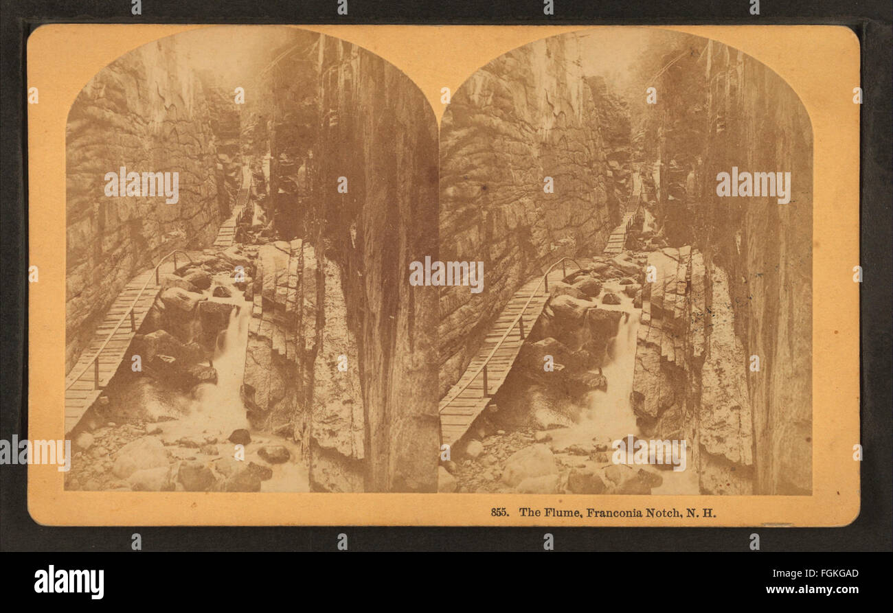 A photograph depicting The Flume, a natural granite gorge in Franconia ...