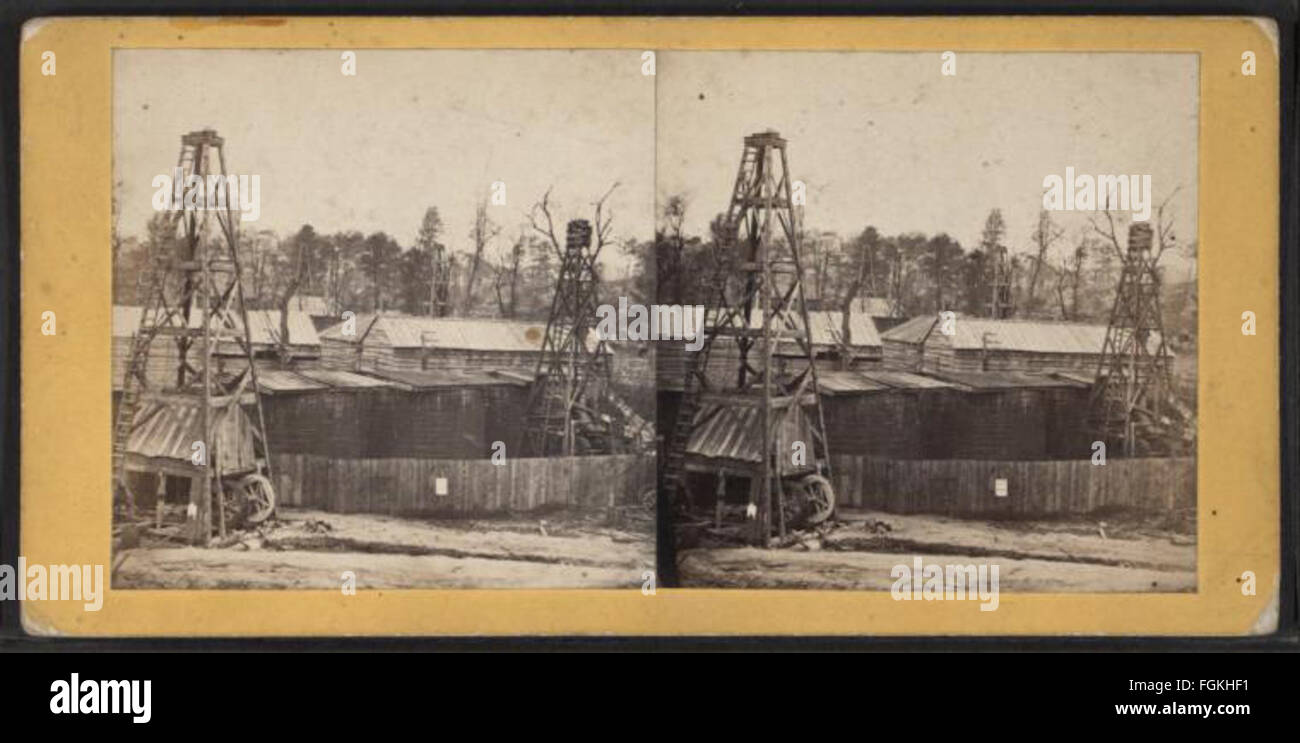 A stereoscopic image showing the old U.S. well, located inside a fenced ...