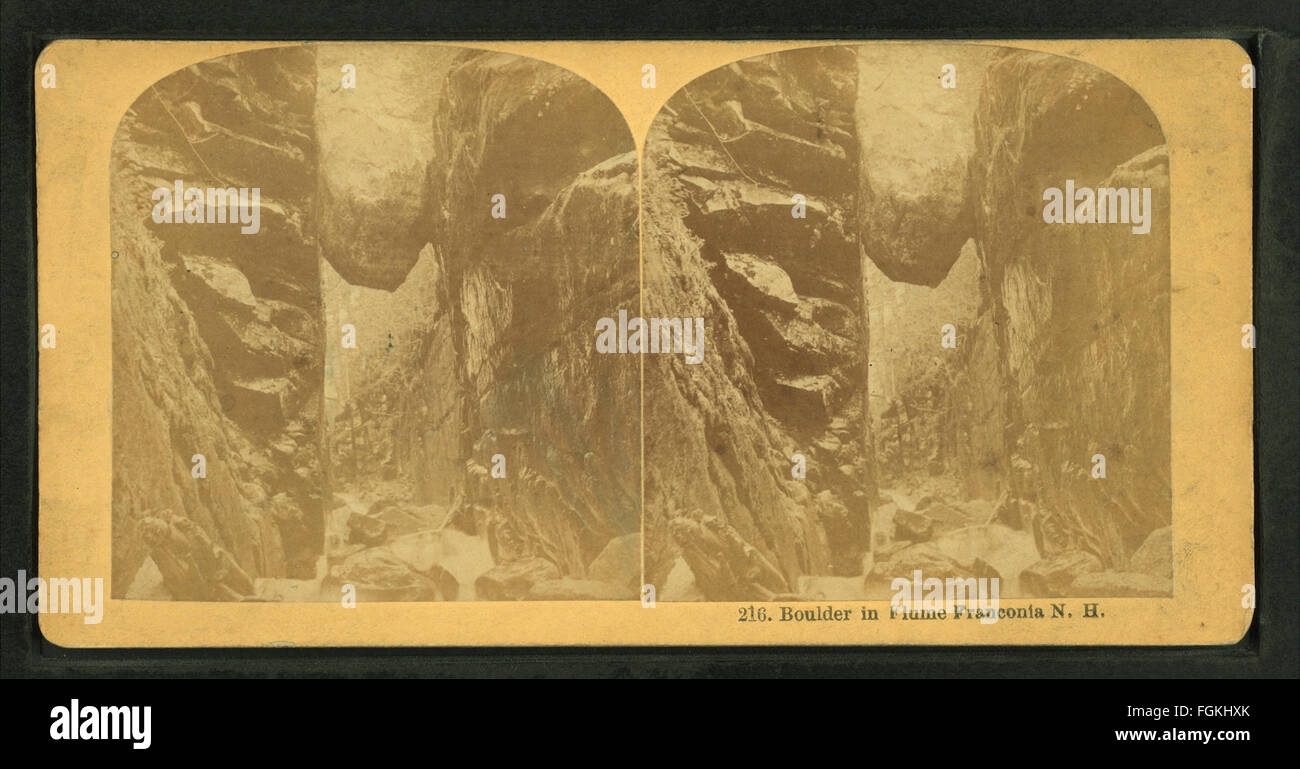 A stereoscopic photograph showing a large boulder in the Flume Gorge ...