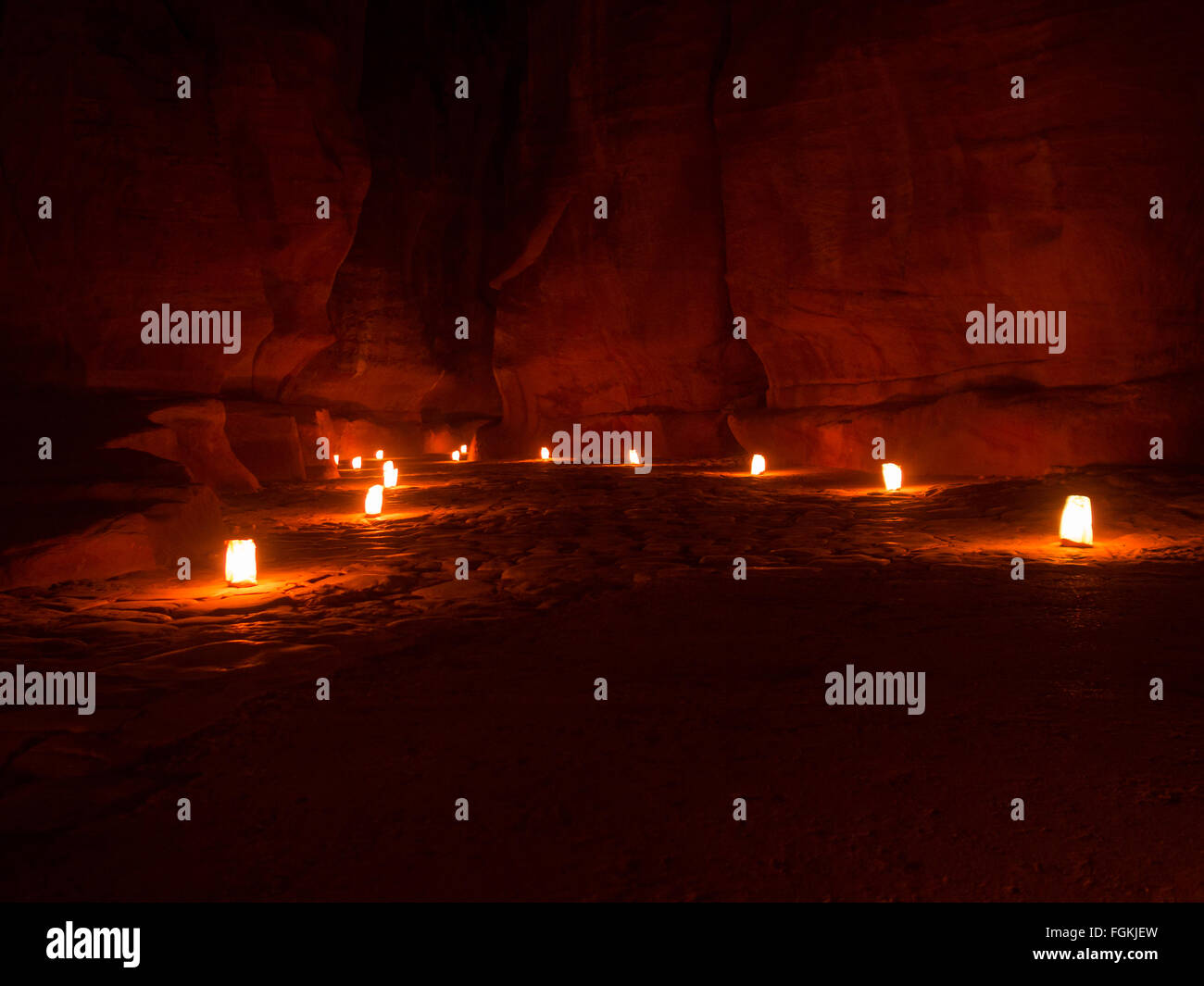 Candle lit Siq in Petra by night Stock Photo - Alamy
