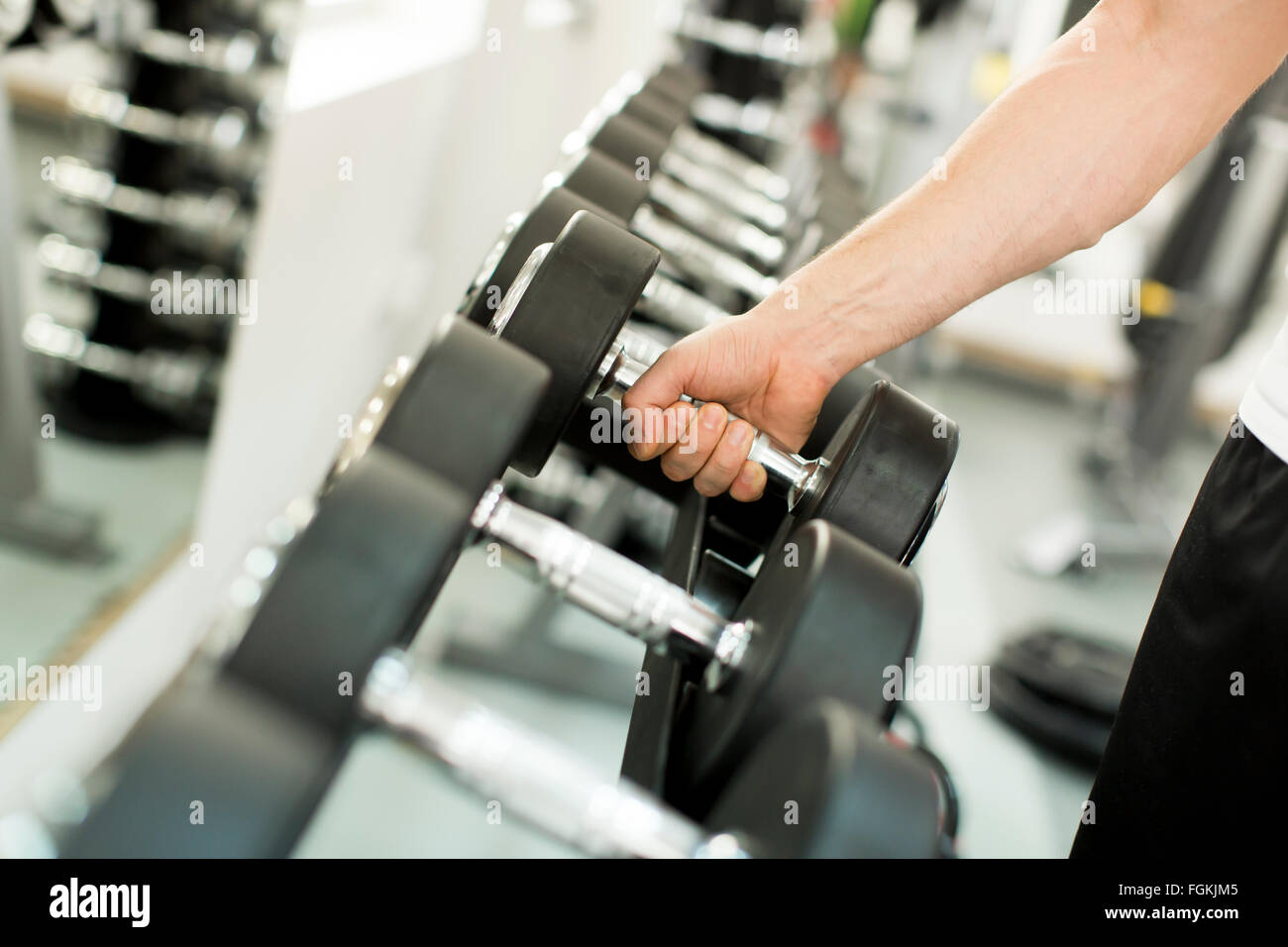 Dumbbell in the gym Stock Photo - Alamy