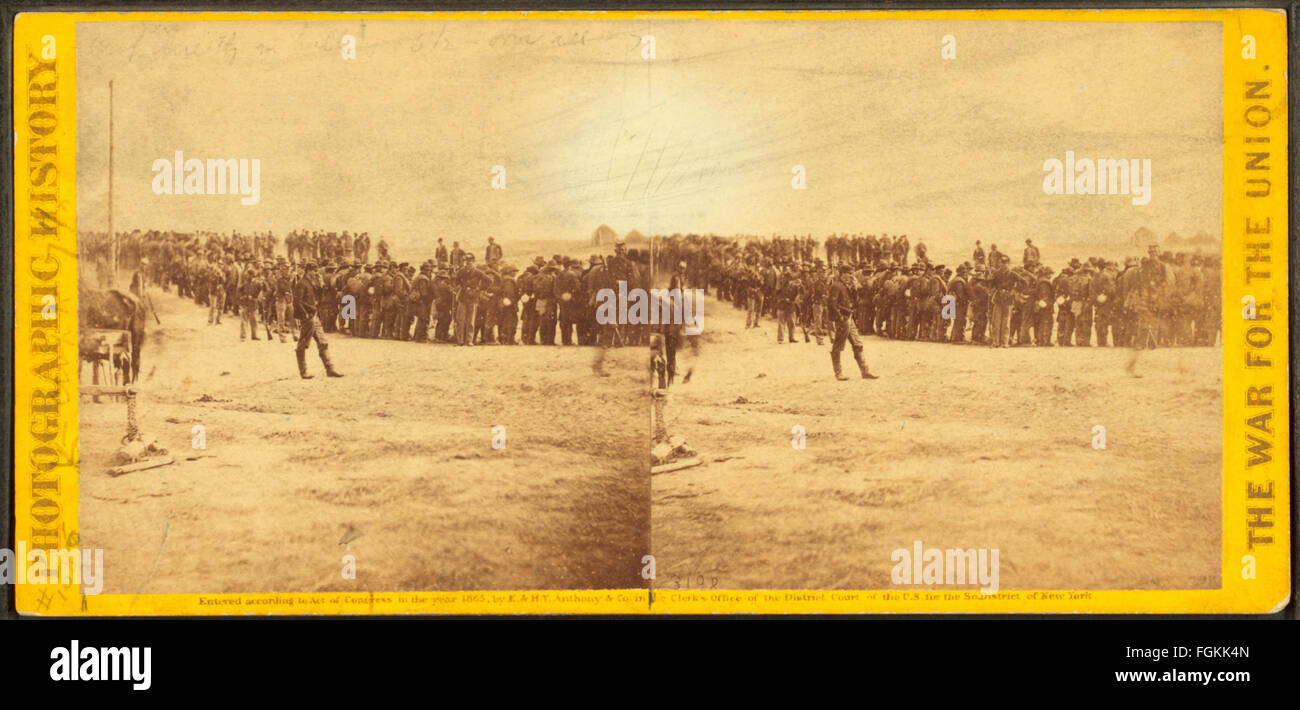 This historical photograph captures a Union picket line in front of ...