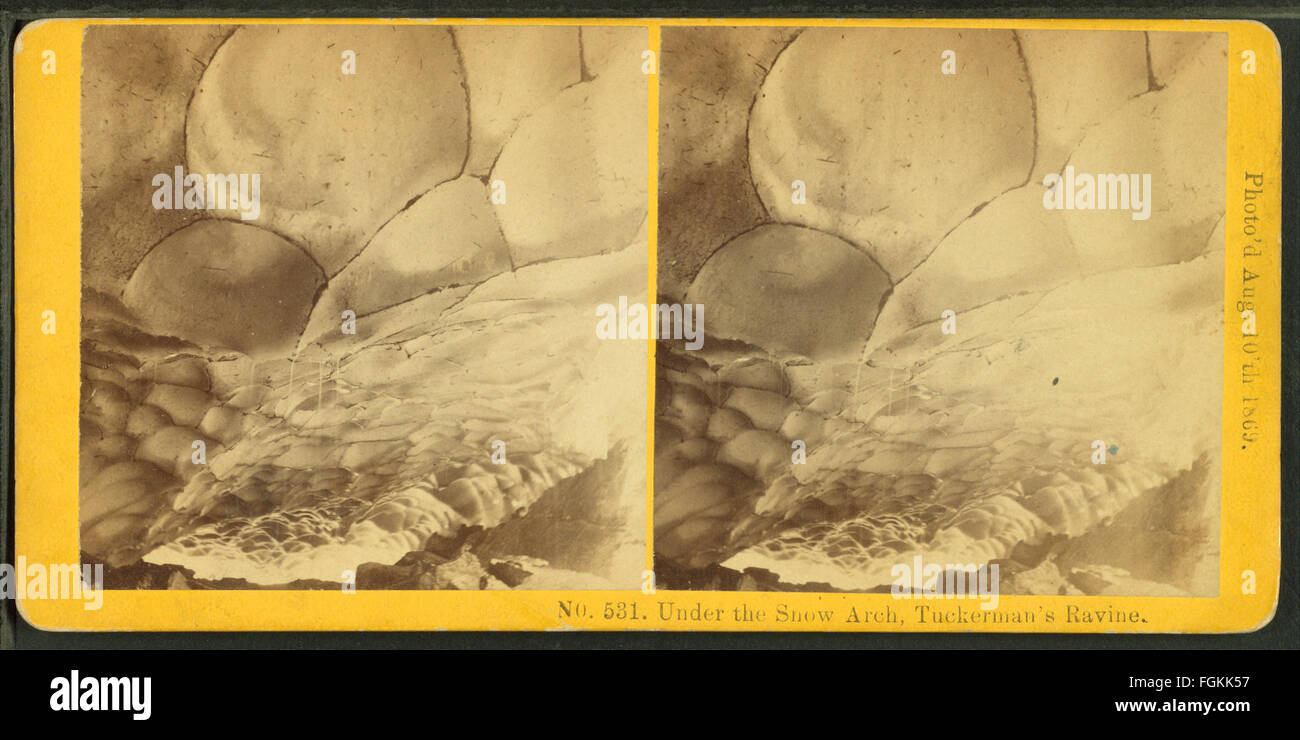 This historic photograph captures the iconic Snow Arch at Tuckerman's ...